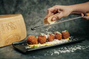 Traditional Italian Fare Flirts with Spanish Gusto At New Restaurant in ...
